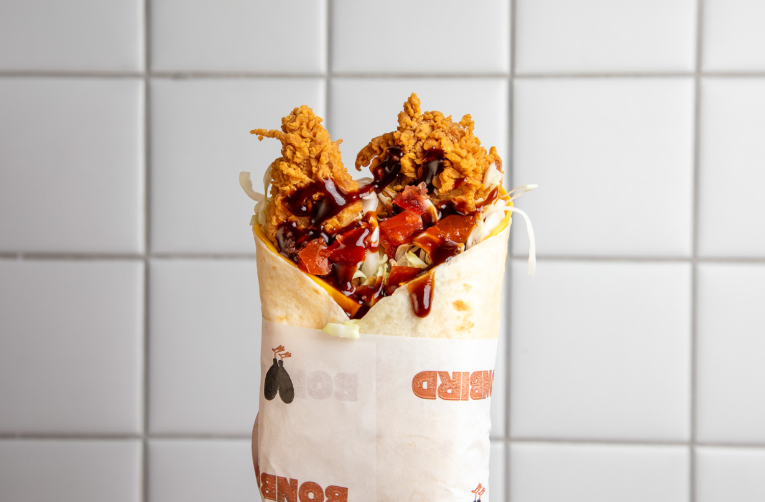 Take away the AED 9 Chicken Wrap at BONBIRD Dubai - Social Kandura